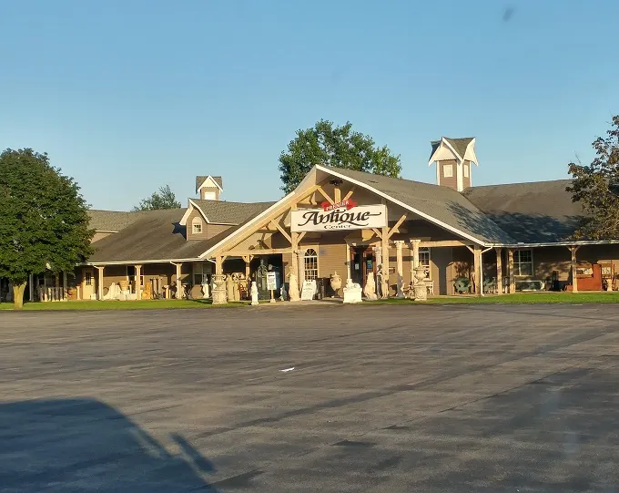The Premier Antique Center welcomes visitors with classical statuary and a touch of elegance, like a museum where everything's actually for sale.