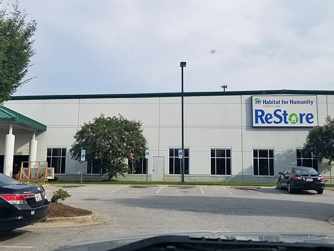 The unassuming exterior of Habitat Wake ReStore hides a treasure trove within, much like that plain-looking book that turns out to be the best read of your life.