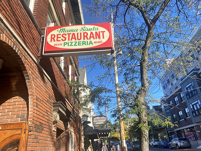 The unassuming brick corner that houses pizza paradise. Like Clark Kent's glasses, this modest exterior hides superhero-level Italian food inside.