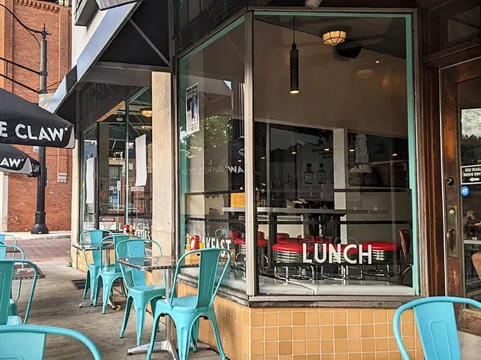 The black awning says it all: "BREAKFAST CURES ALL." At Hang Over Easy, they're not just making a promise—they're offering salvation by spatula.