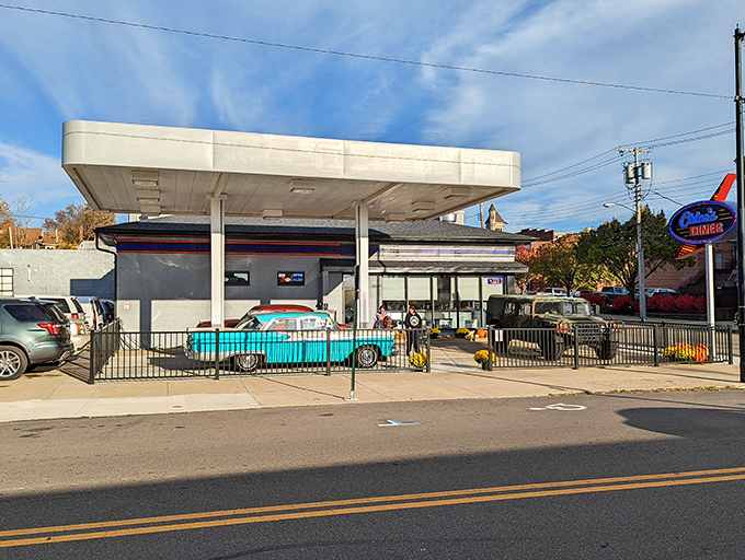 The classic gas station-turned-diner exterior isn't just nostalgic—it's a promise that what awaits inside will fuel more than just your car.