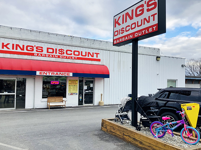 The classic red awning and bold signage announce your arrival at bargain paradise. No fancy frills needed when the deals inside speak volumes. 