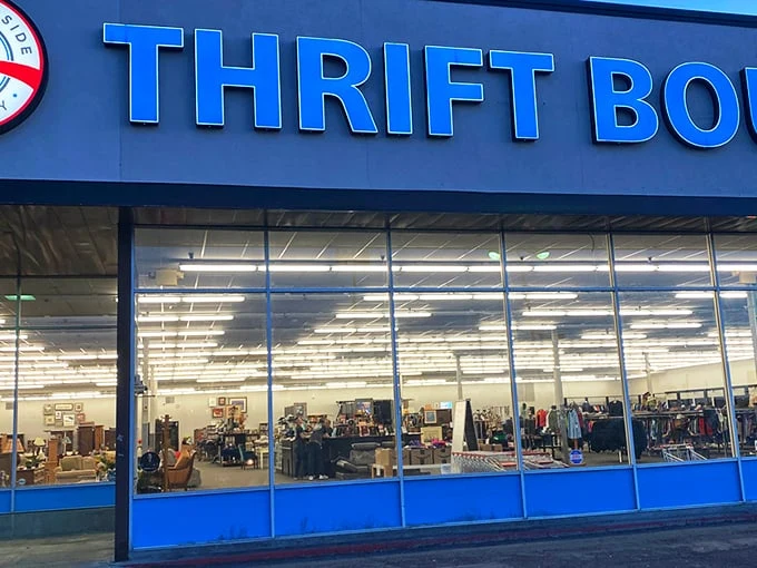 The blue sign beckons like a siren call to treasure hunters. This unassuming storefront in Millcreek hides a universe of possibilities inside.