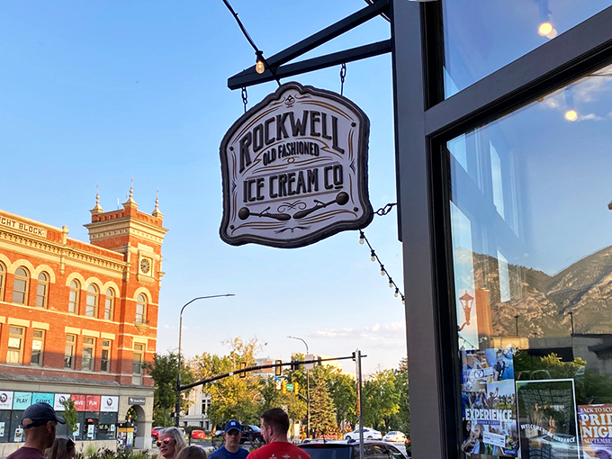 The storefront beckons like an ice cream oasis in downtown Provo, with mountains framing this temple of frozen delights.