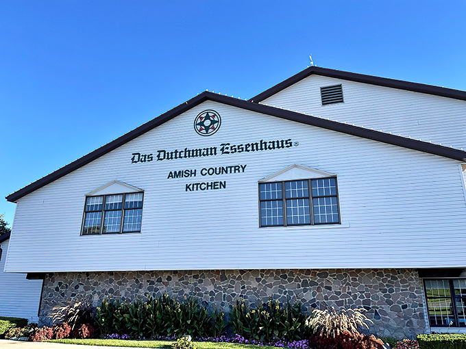 The white clapboard façade of Das Dutchman Essenhaus stands like a beacon of comfort food in Amish Country. No golden arches needed when you've got authentic tradition.