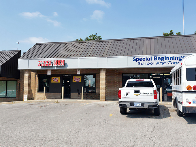The unassuming storefront of The Pizza Man in Lenexa might fool you, but locals know this brick façade hides Chicago-style treasures worth the pilgrimage.