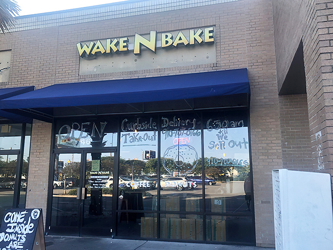 The unassuming brick exterior of Wake N Bake belies the sugar-laden treasures within—like finding a treasure chest disguised as an ordinary mailbox.