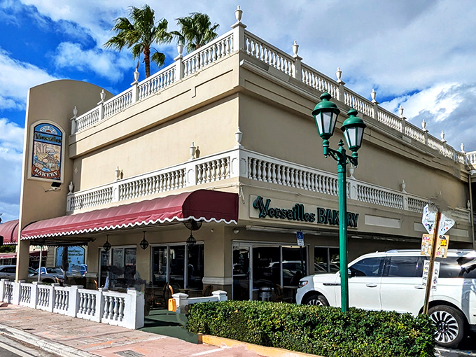 The palace of Cuban cuisine stands regally on Calle Ocho, its yellow façade and burgundy awning beckoning hungry pilgrims like a delicious mirage.