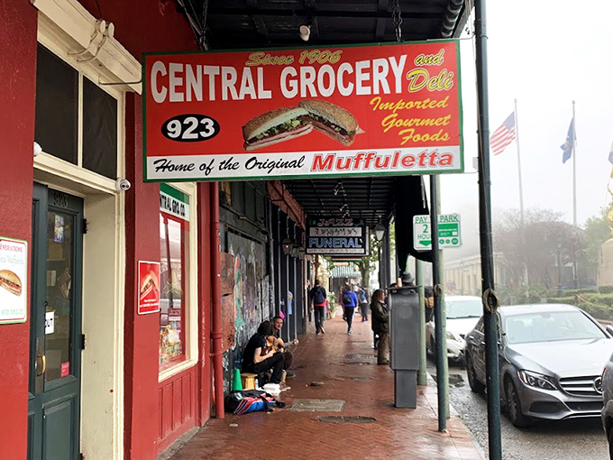 The iconic red storefront on Decatur Street has been beckoning sandwich pilgrims since 1906, proudly declaring itself "Home of the Original Muffuletta."