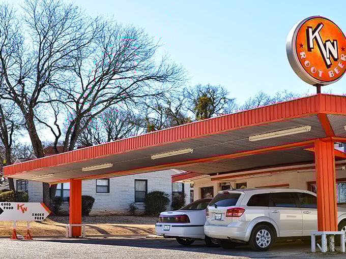 The unassuming exterior of K N Root Beer Drive In proves once again that Texas's greatest culinary treasures often hide in plain sight.