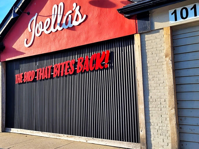 The Bird That Bites Back! isn't just a catchy slogan—it's a fiery promise painted across Joella's distinctive red facade that beckons heat-seekers from miles around.