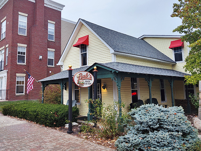 The charming yellow house on Carmel's Main Street isn't just another pretty facade—it's home to some of Indiana's most celebrated beef architecture.