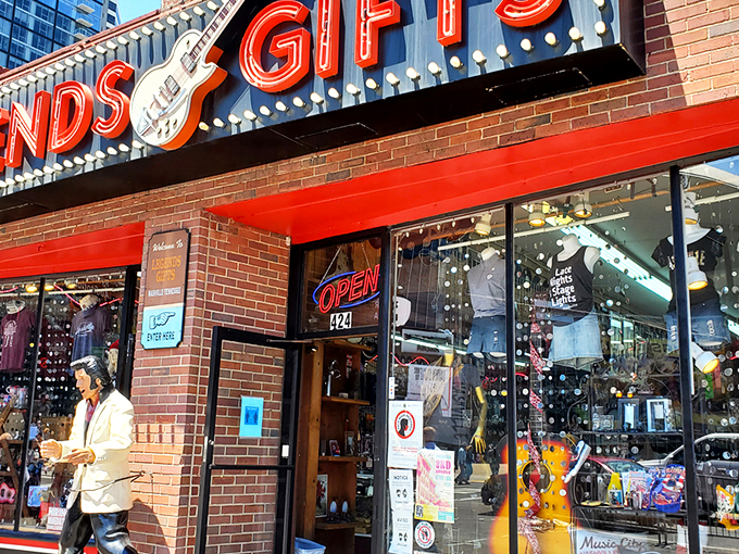 The iconic red Legends Gifts storefront beckons like a siren song to Nashville visitors. That guitar silhouette isn't just decoration—it's a promise of melodious treasures within.