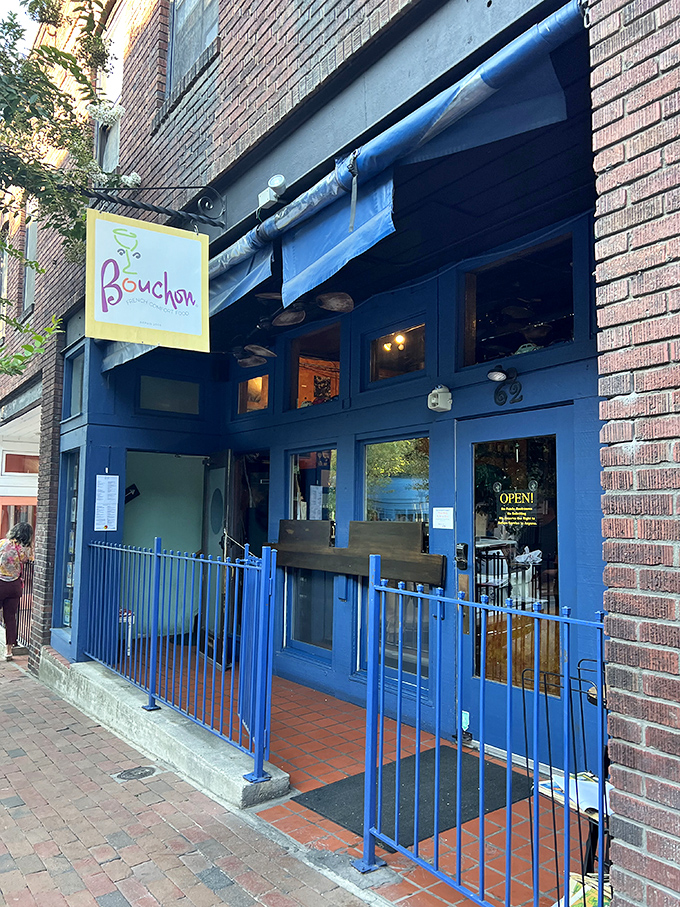 Bouchon's cheerful blue awning and warm wooden façade beckon like a Parisian whisper on Asheville's eclectic Lexington Avenue.