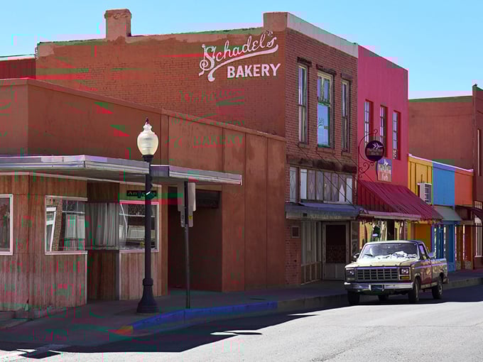 Schaedel's Bakery stands as a colorful sentinel on Silver City's main drag, promising sweet treasures within those brick walls that have witnessed decades of downtown life.
