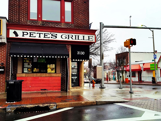 The unassuming brick facade of Pete's Grille stands like a breakfast beacon on Greenmount Avenue, promising honest food without the frills. 