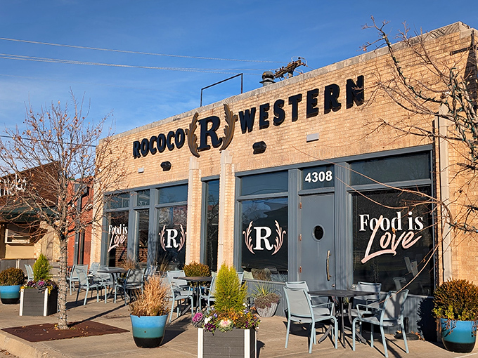 Twinkling lights and a welcoming glow – Rococo on Western transforms from unassuming brick storefront to culinary beacon after sunset.