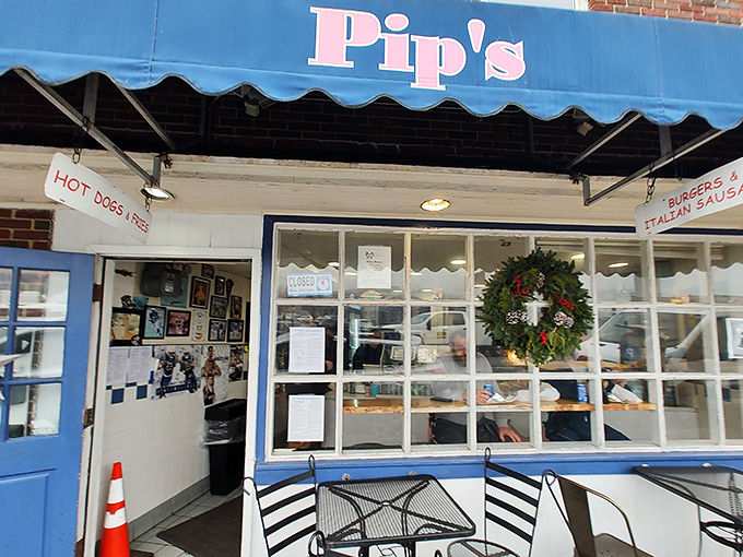 The little blue awning on Dock Street beckons like a nautical flag signal that translates to "Come get the best hot dogs in Annapolis right here!"
