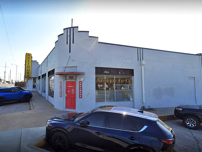 The unassuming white exterior with that iconic red door is like a portal to another dimension—one where time slows down and treasures await.