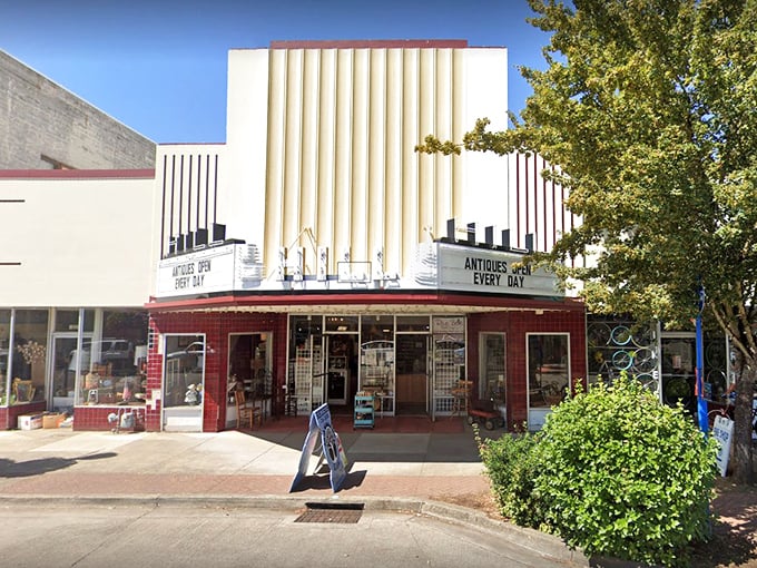 The former Hill Theatre now houses treasures instead of movies. This vintage marquee promises a different kind of entertainment—one where you're the star of your own treasure hunt.