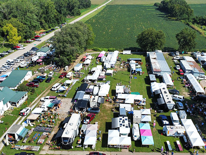 From this aerial view, Sparks Flea Market resembles a treasure hunter's Disneyland—white tents and colorful displays sprawling across the Kansas countryside.