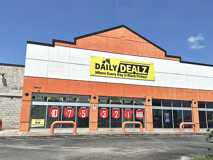 The bright orange facade of Daily Dealz stands out like a bargain beacon, complete with its promise that "Every Day is Black Friday!" No false advertising here.