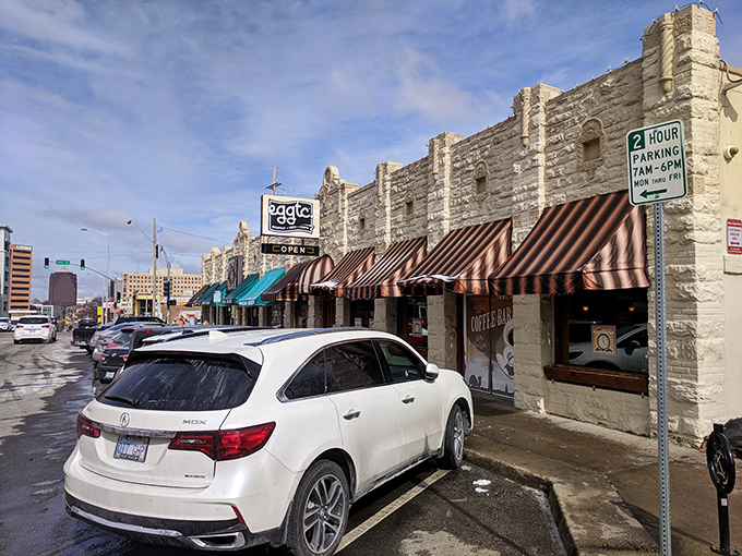 The stone façade of eggtc. with its charming striped awnings feels like discovering a secret breakfast society you've always wanted to join.