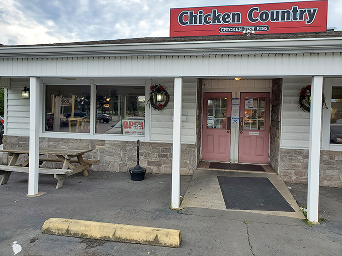 The unassuming exterior of Chicken Country might not win architectural awards, but that parking lot full of locals tells the real story.