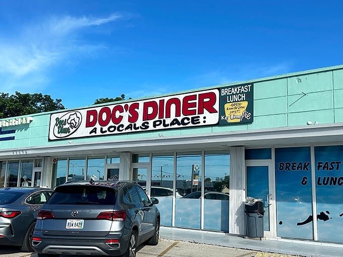 Doc's Diner announces itself with no-nonsense charm—a mint-green beacon of breakfast hope along the Overseas Highway in Key Largo.