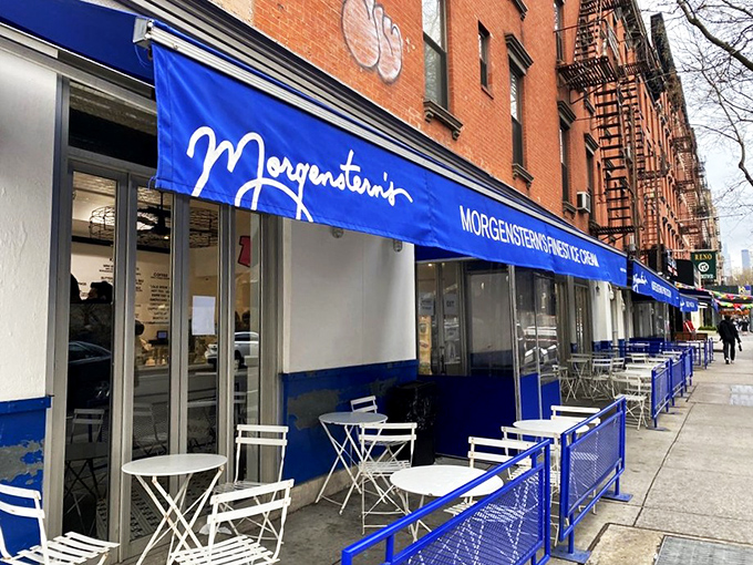That iconic blue awning against classic New York brick is like a beacon for ice cream pilgrims. Sidewalk seating adds the perfect touch of urban charm.