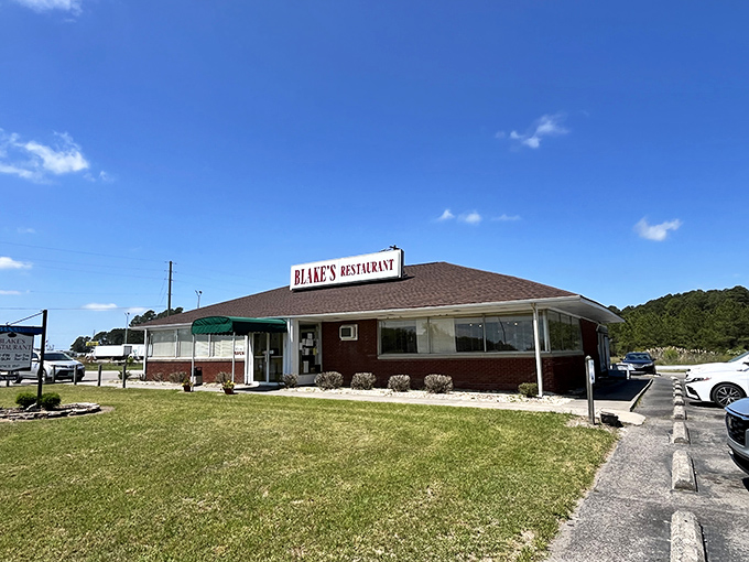 Blake's Restaurant stands proudly against the Carolina blue sky, a brick-and-mortar promise of comfort food that's kept its word for decades. 