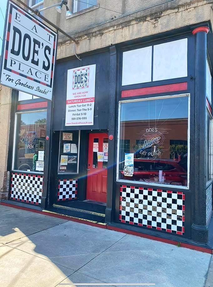 The unassuming exterior of Doe's Eat Place hides culinary greatness within, like finding a diamond in your backyard. That yellow truck knows what's up! 