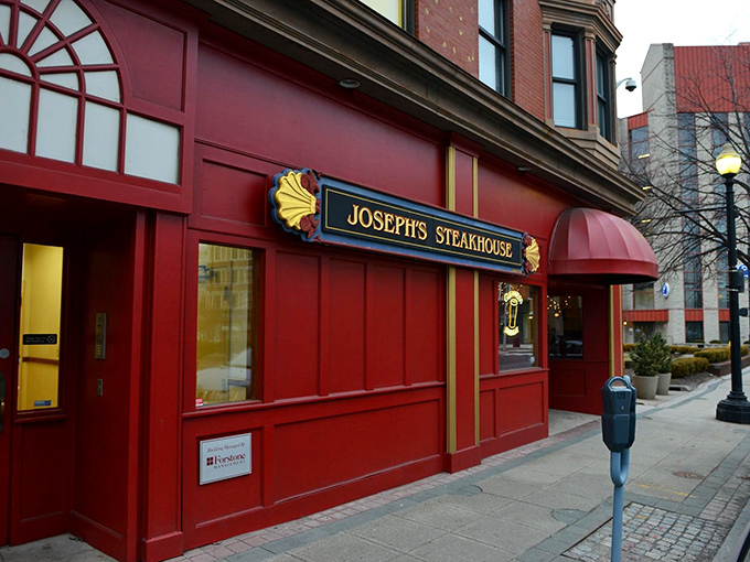 The unassuming brick façade of Joseph's Steakhouse hides culinary greatness like Clark Kent's glasses hide Superman. Classic signage promises old-school excellence.