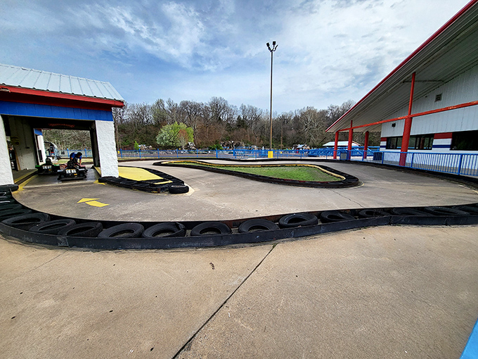 The winding track at Lokomotion beckons speed demons of all ages. Those red and blue barriers aren't just for show—they've caught many an overzealous driver with NASCAR dreams.