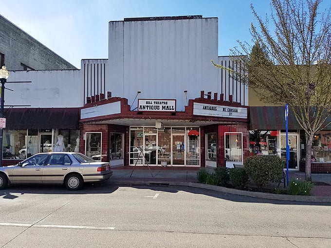 The former Hill Theatre now houses treasures instead of movies. This vintage marquee promises a different kind of entertainment—one where you're the star of your own treasure hunt.