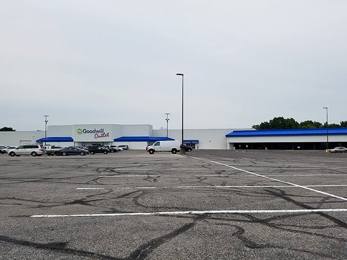 The unassuming exterior of Goodwill Outlet belies the treasure-hunting adventure within, like a pirate's chest disguised as an ordinary shipping container.