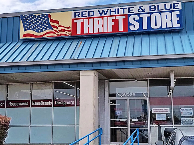 The patriotic facade of Red White & Blue Thrift Store stands like a treasure chest waiting to be opened, promising adventures in secondhand splendor under the Louisiana sun.