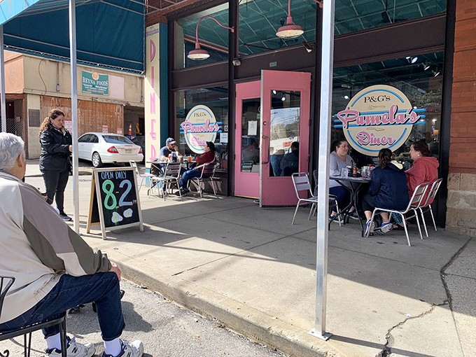 Pittsburgh's breakfast mecca announces itself with a cheerful blue awning and pink accents. The line forms early—locals know some traditions are worth the wait.