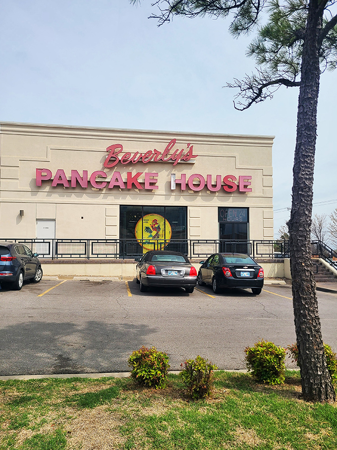 That iconic pink neon sign isn't just advertising – it's a 24-hour beacon calling to hungry souls across Oklahoma City.