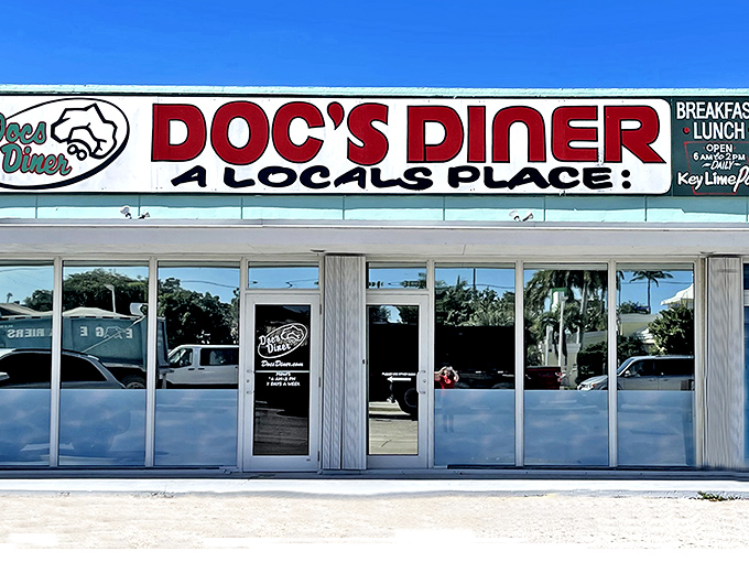 Doc's Diner announces itself with no-nonsense charm—a mint-green beacon of breakfast hope along the Overseas Highway in Key Largo.