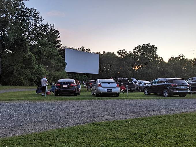 Classic cars line up at the Kenda Drive-In, where nostalgia isn't just served—it's parked right next to you on movie night.