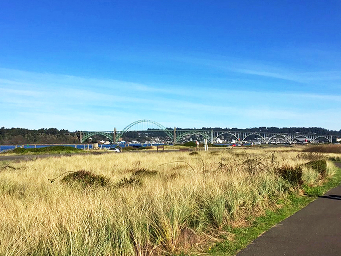 The welcoming sign at South Jetty offers more than directions—it's your first taste of adventure in this slice of Oregon Dunes National Recreation Area paradise. 