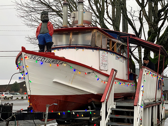 The iconic Bowpicker boat sits proudly on land, a retired fishing vessel now serving up treasures of a different kind. The nautical-to-culinary career change we all secretly admire.