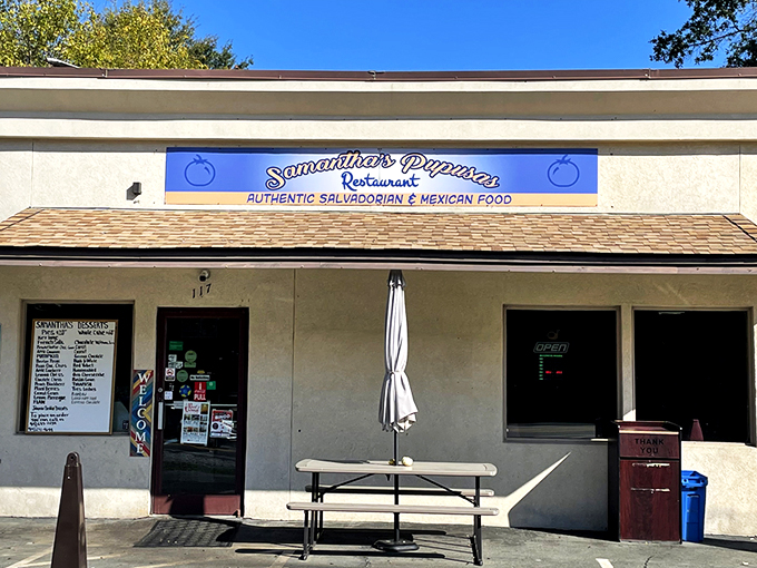 The unassuming blue sign beckons like a culinary lighthouse – proof that the best food often hides in plain sight rather than behind fancy facades.