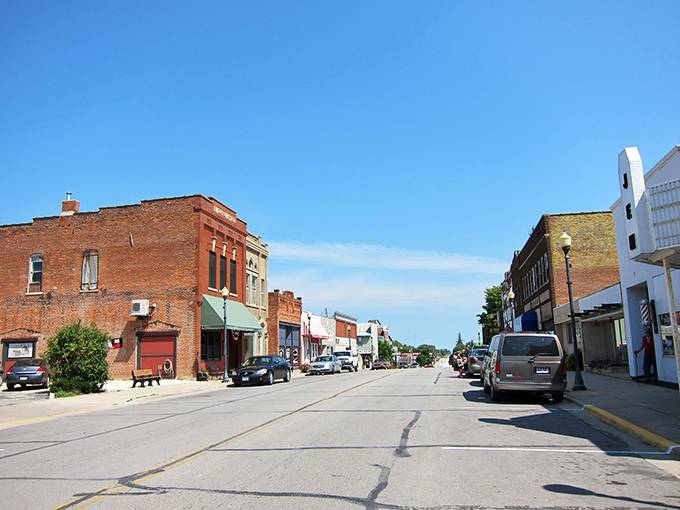 Main Street Harmony whispers stories of simpler times, where brick buildings stand proud against Minnesota's blue skies. Small-town America at its most authentic.