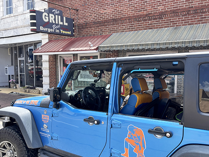 The sign doesn't lie—this unassuming brick storefront houses burger magic that's drawn pilgrims from across Georgia for good reason.