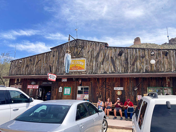 The Wild West isn't dead—it's just waiting for you at Tortilla Flat Saloon, where weathered wood and desert mountains create the perfect backdrop for adventure.