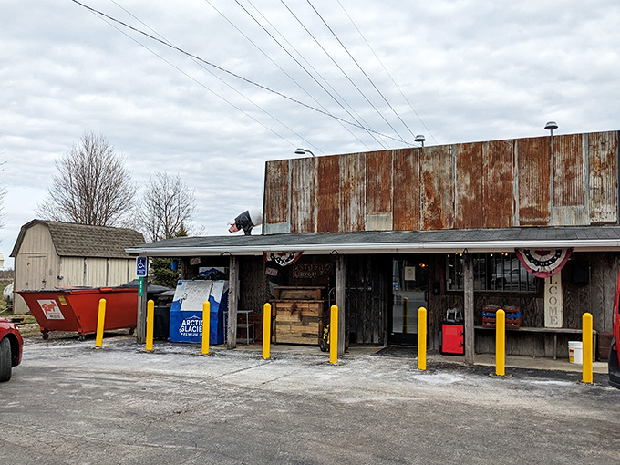 The rusted metal exterior isn't a gimmick—it's a promise. Authentic barbecue happens behind those weathered walls, where smoke signals spell "paradise."