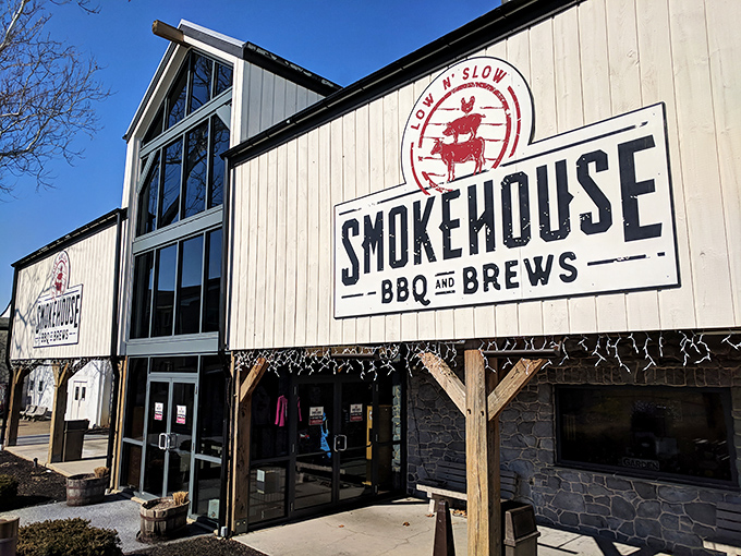 The barn-like exterior isn't just architectural—it's truth in advertising. This wooden temple to "Low N' Slow" barbecue promises smoke-kissed delights within.