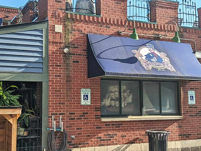 The brick facade of Aristocrat Pub welcomes you like an old friend who happens to make incredible fish and chips. No secret handshake required.